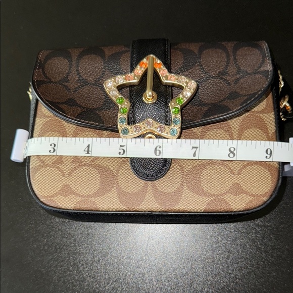 Coach | Bags | Coach Brown And Black Crossbody Bag With Star Clasp ...